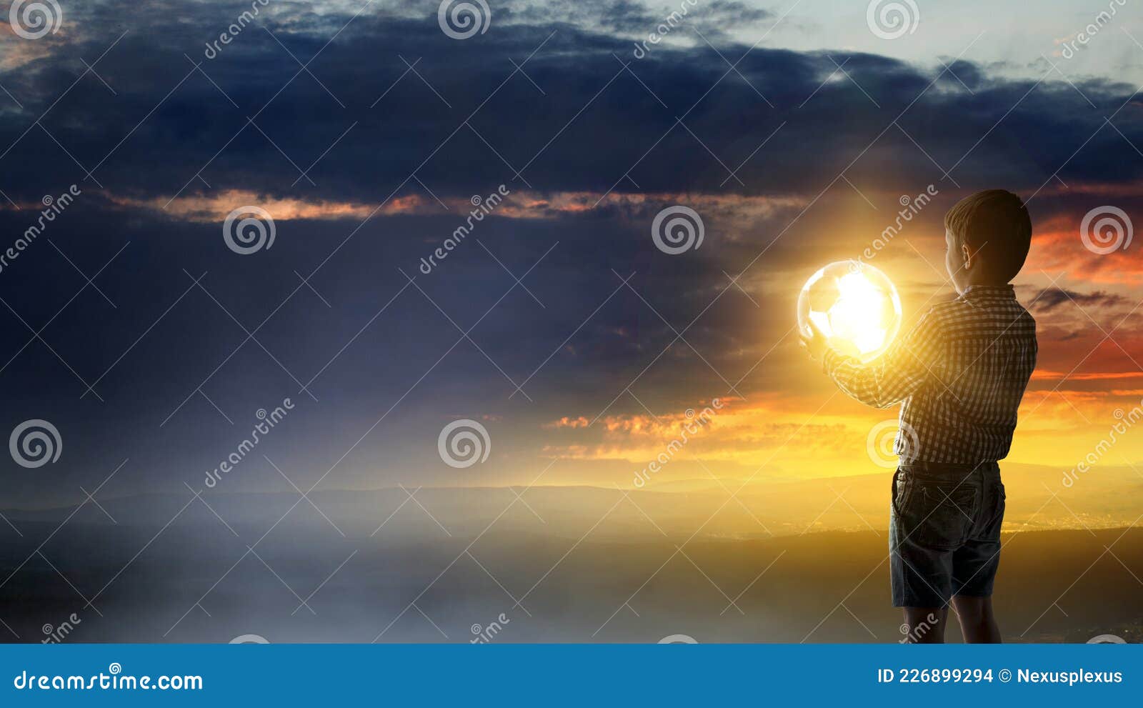 Boy holding moon at night stock photo. Image of planet - 226899294