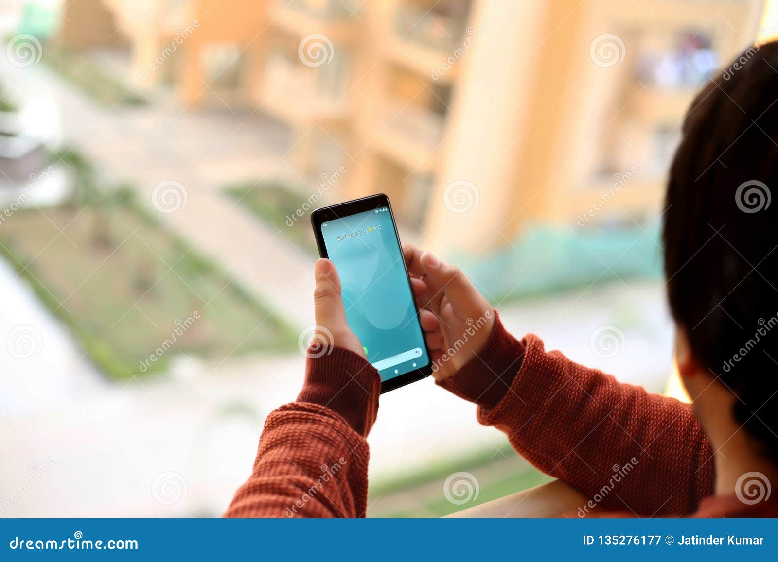 Boy is Holding Phone in Hand Stock Image - Image of cheerful, cloth ...