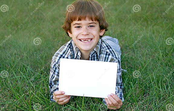 Boy Holding Sign stock image. Image of childhood, child - 3298317