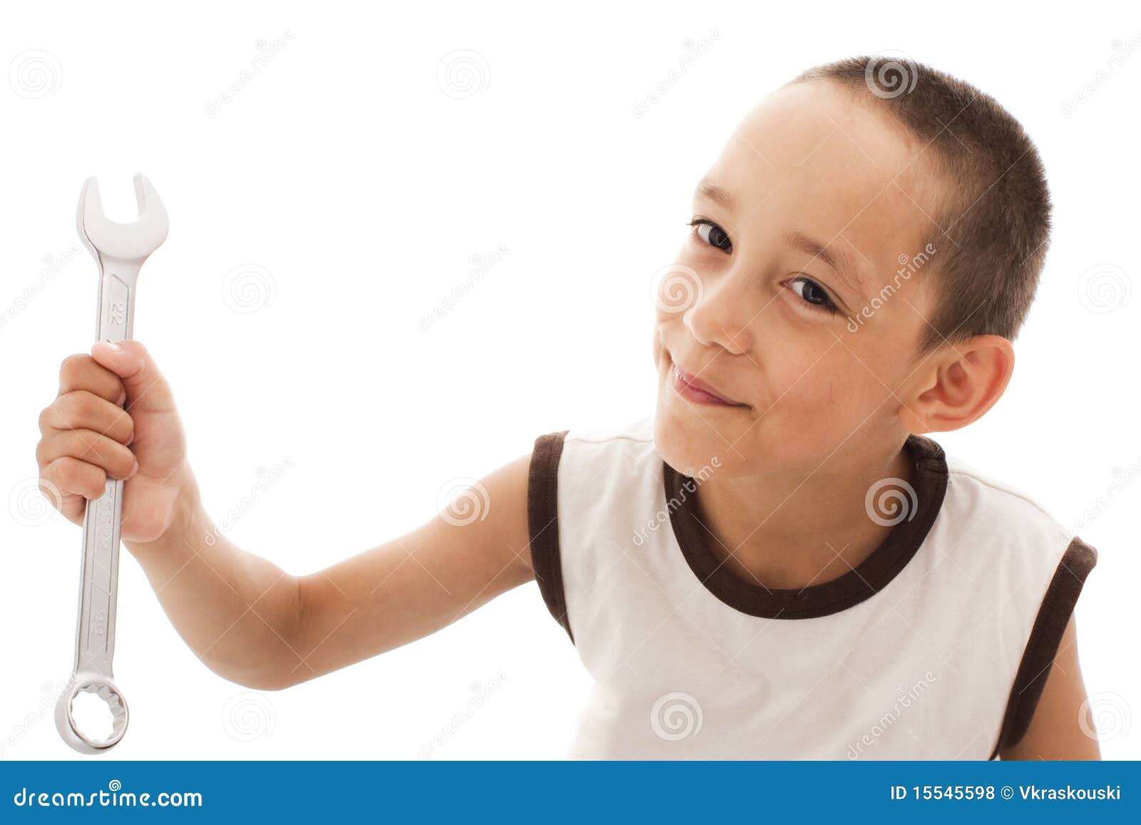 Boy holding spanner stock photo. Image of pose, industry - 15545598