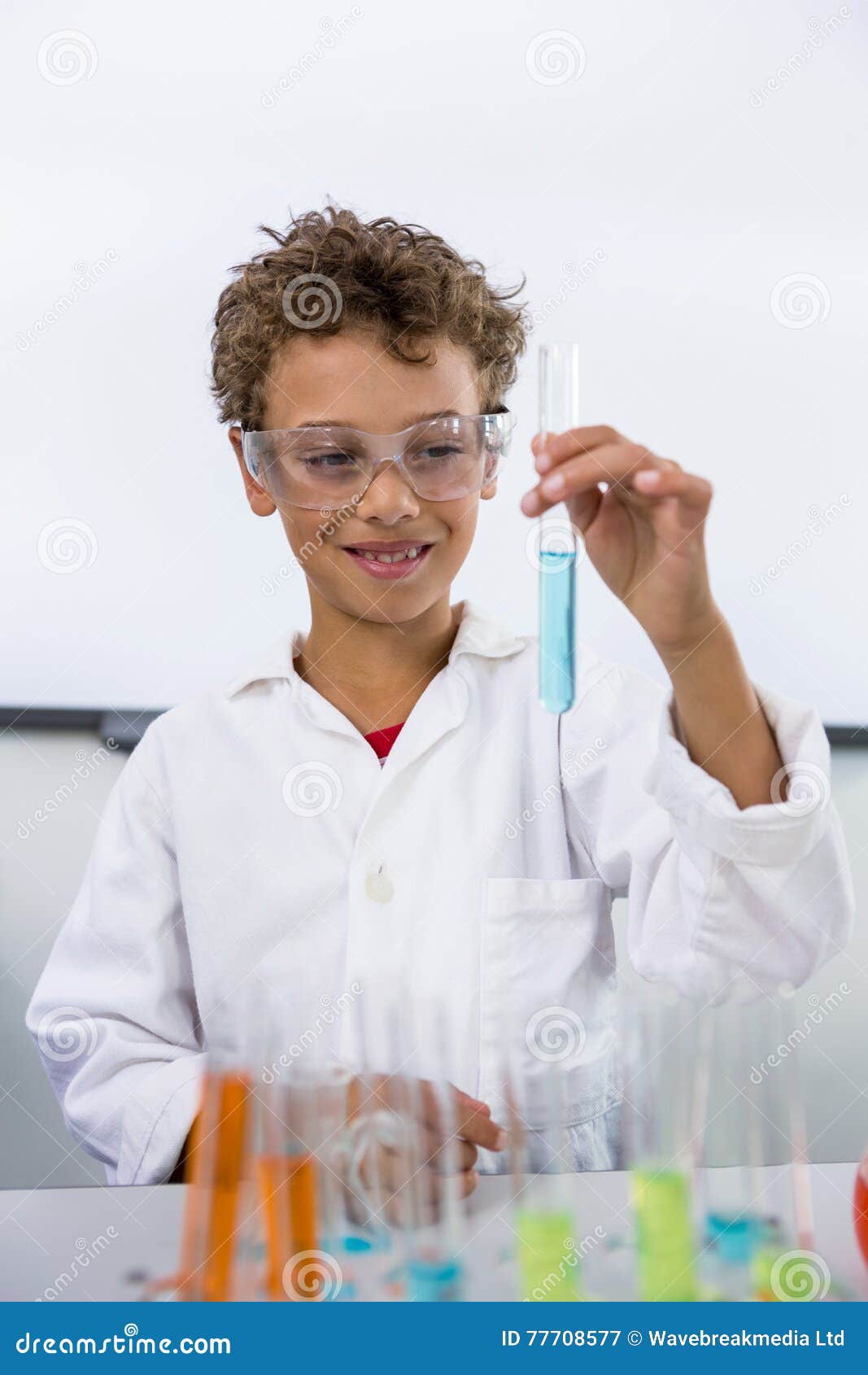 Boy Holding Test Tube with Liquid at Laboratory Stock Image - Image of ...