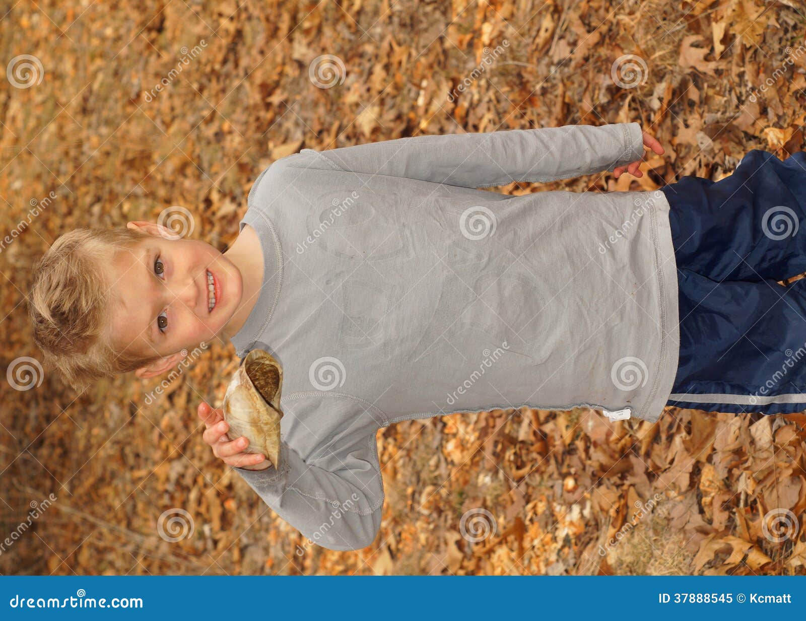 Boy holding turtle shell stock image. Image of outside - 37888545