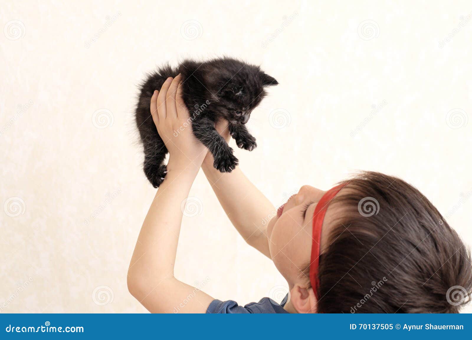 Boy Holding Up Black Kitten Stock Image - Image of frend, newborn: 70137505