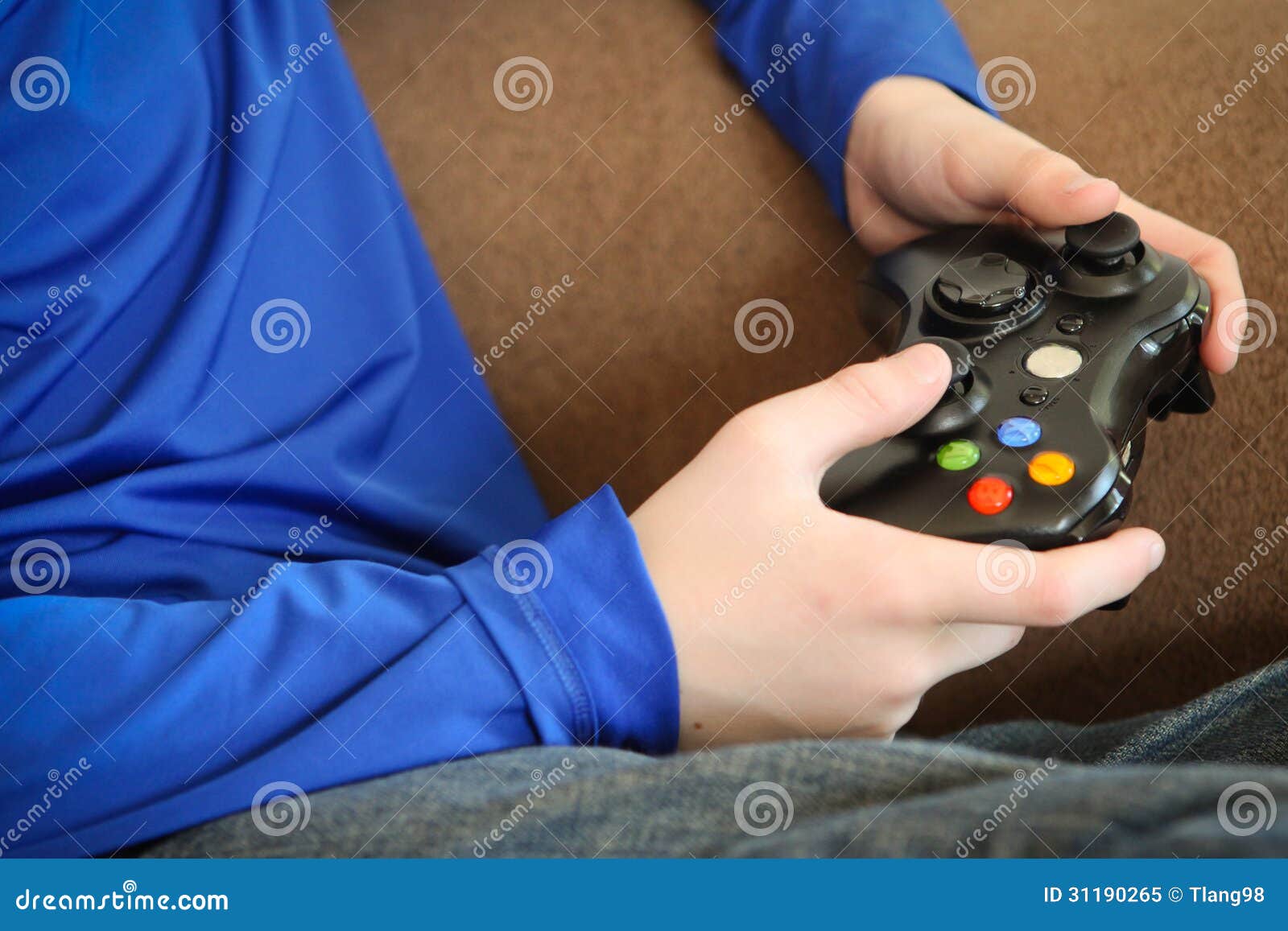 Boy Holding Video Game Controller Stock Image - Image of blue ...