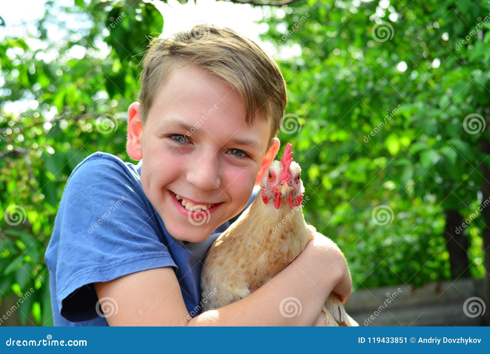 The Boy is Holding a White Chicken and Smiling Stock Image - Image of ...