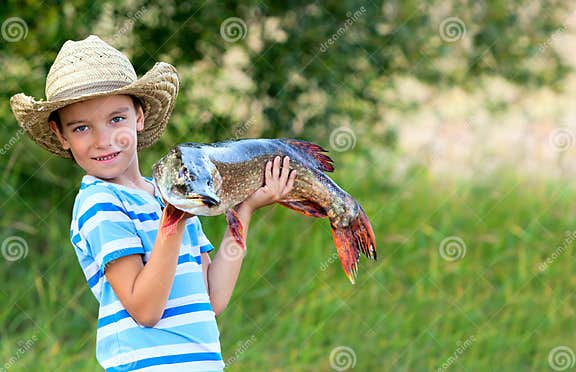 Boy holds big fish stock photo. Image of closeup, catch - 26342460