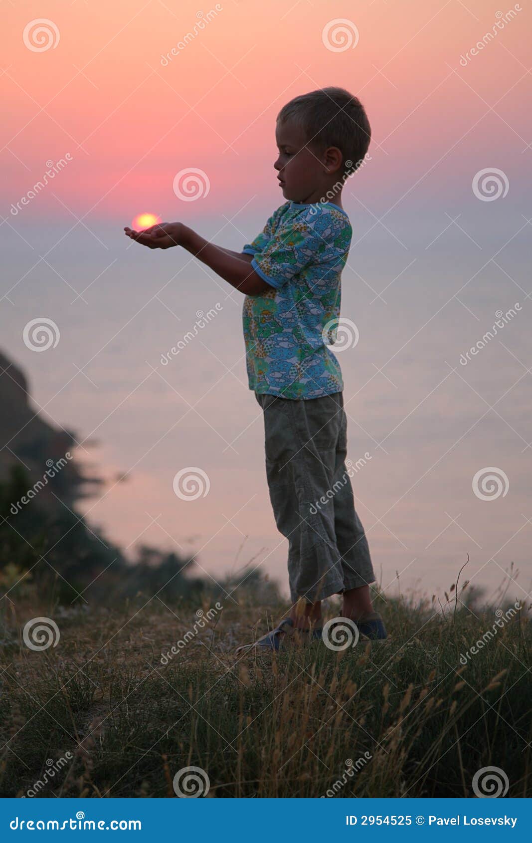 Boy holds the sun in hands stock image. Image of people - 2954525