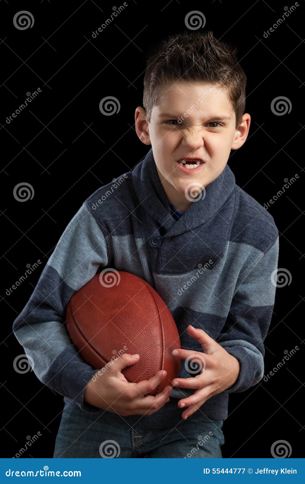 Boy Holidng Football and Making Scary Face Stock Image - Image of jock ...