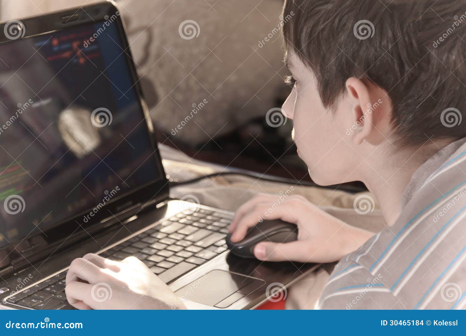 Boy and home computer stock photo. Image of habit, playing - 30465184