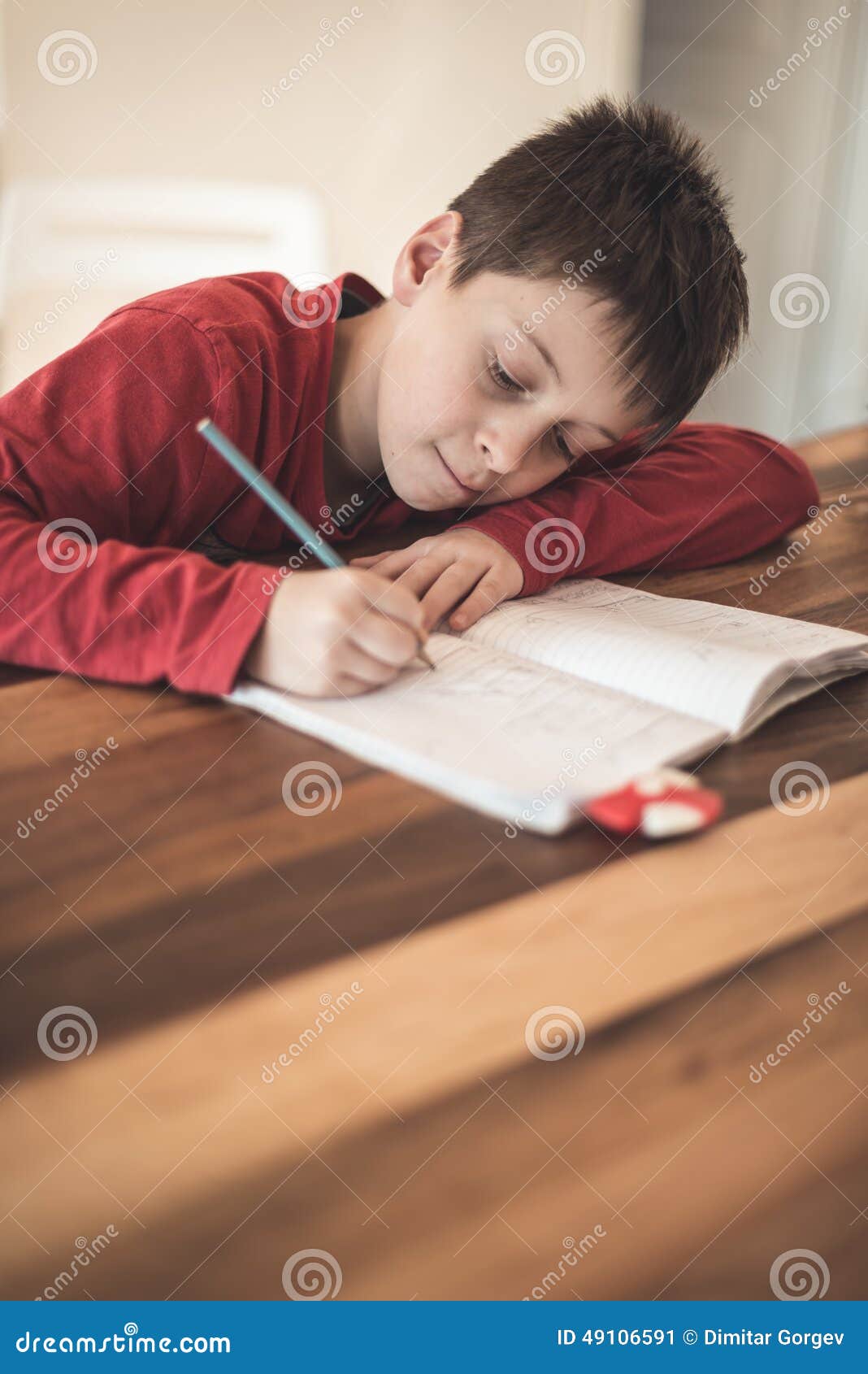 Boy with homework stock image. Image of childhood, home - 49106591