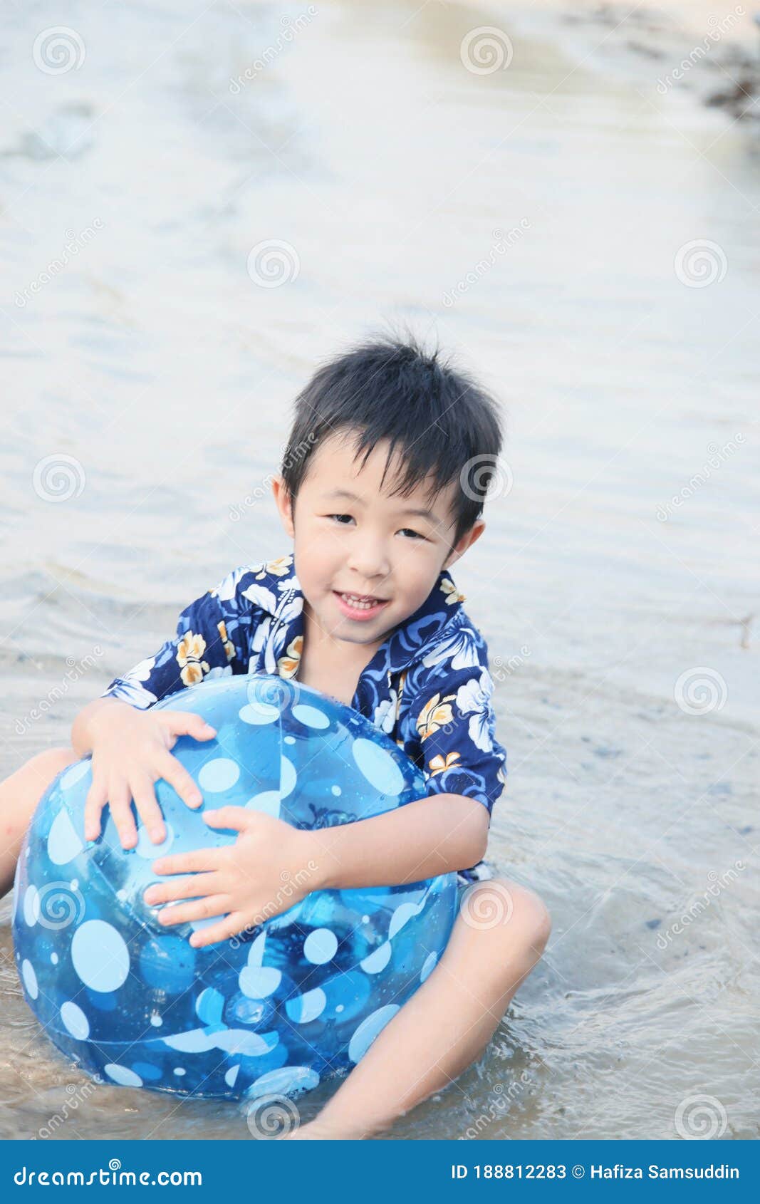 Boy Hugging a Beach Ball. Conceptual Image Stock Image - Image of ...