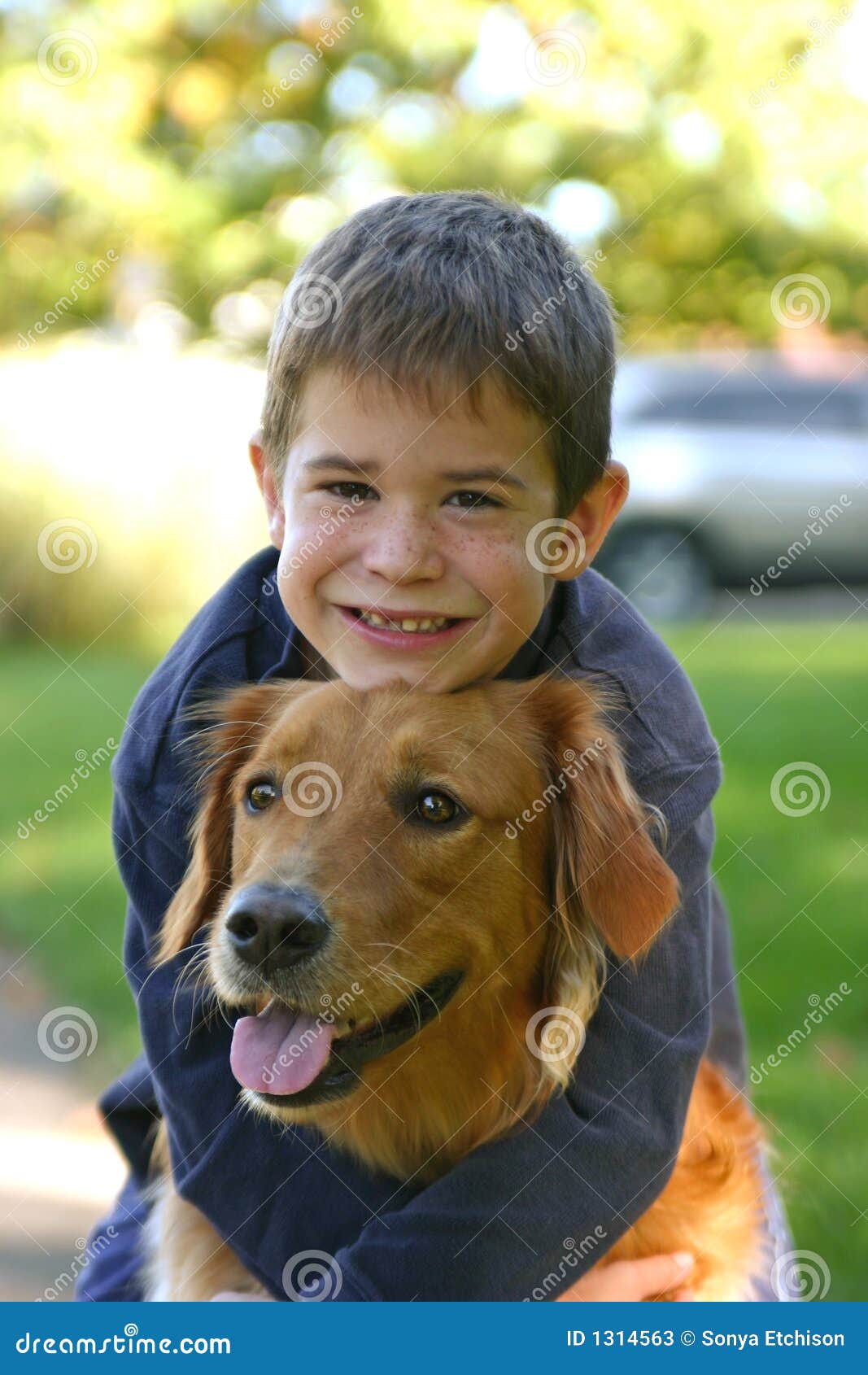 Boy Hugging Dog stock image. Image of face, happiness - 1314563