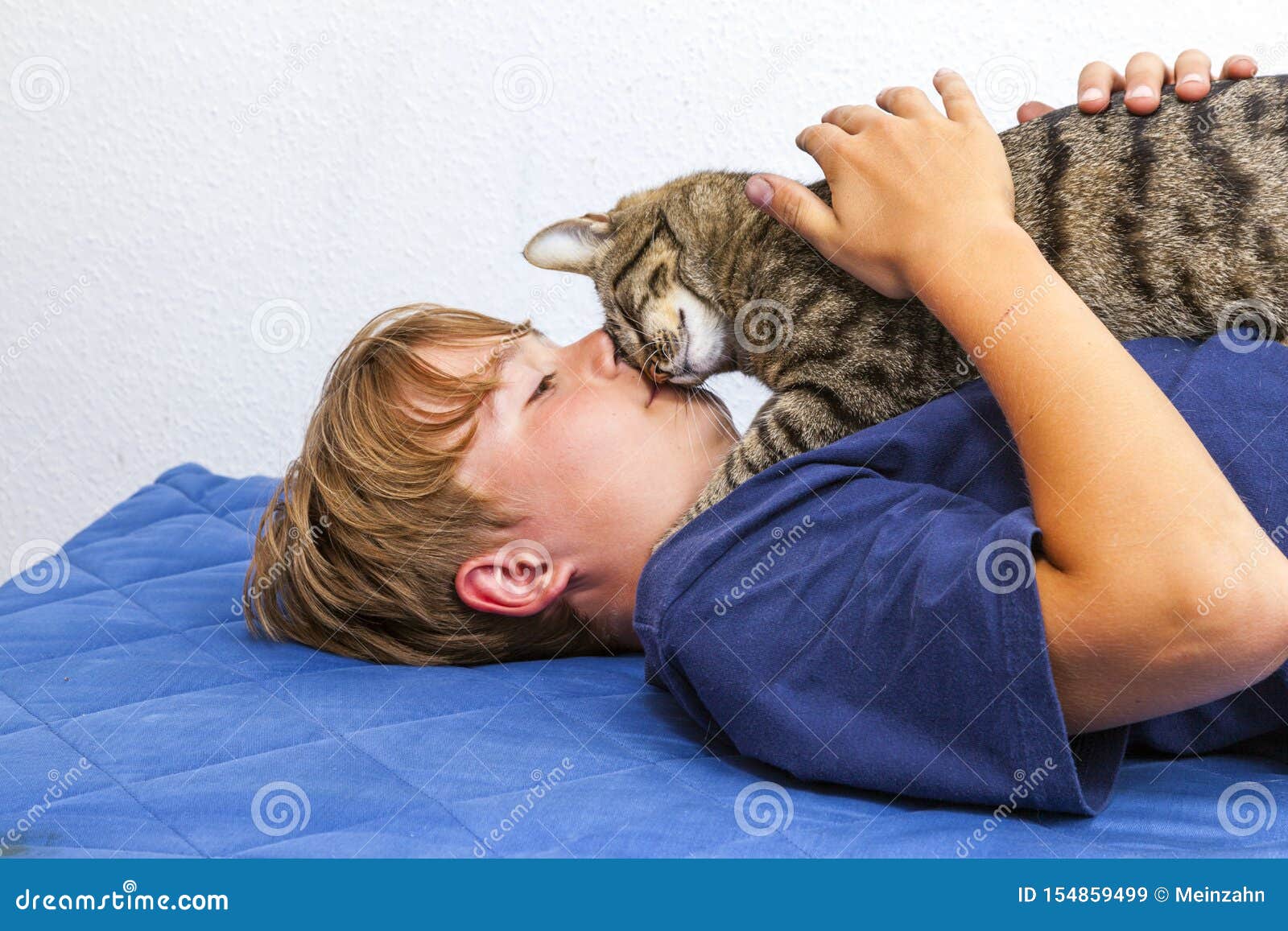 Boy hugging with his cat stock image. Image of cheeky - 154859499