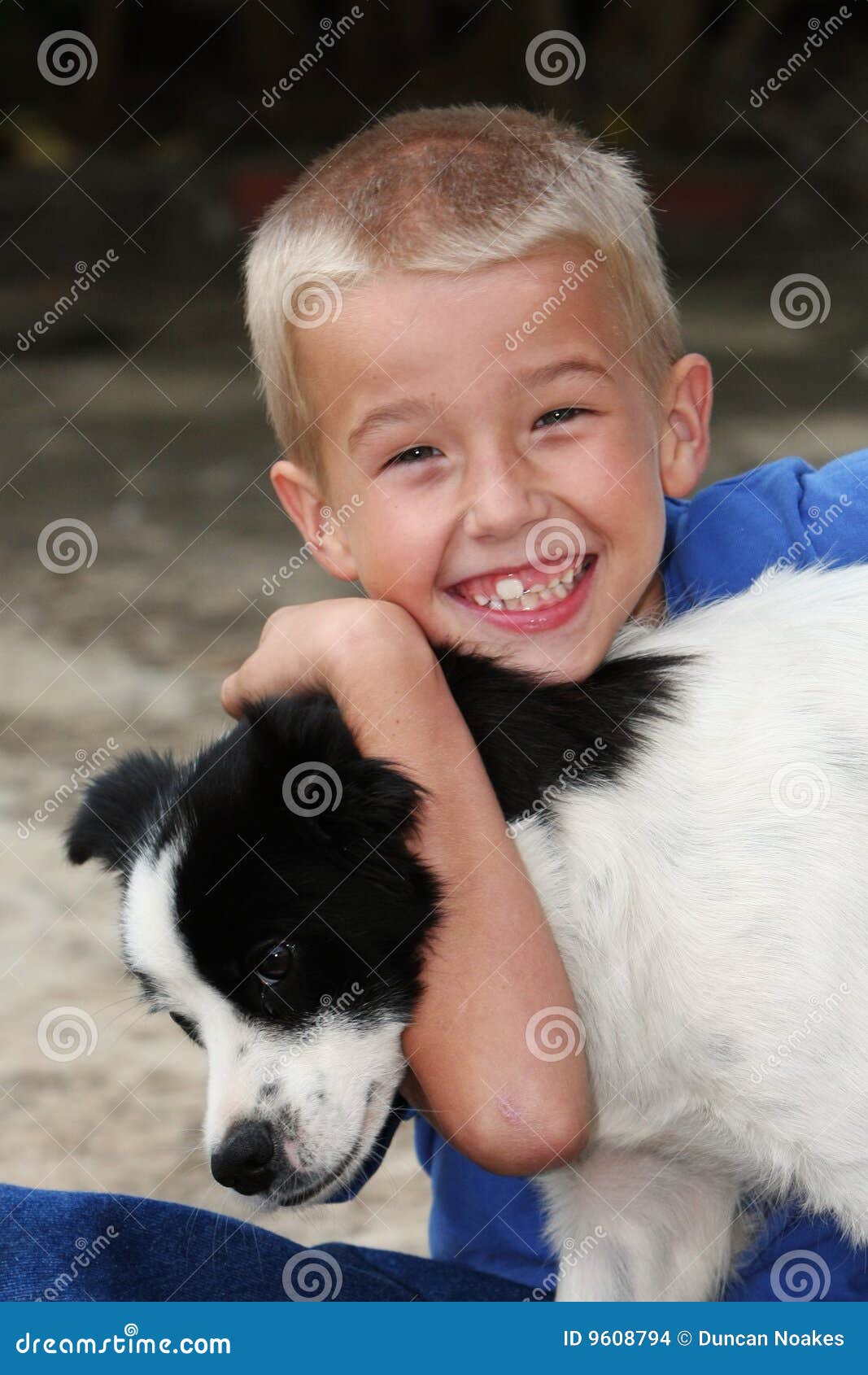 Boy Hugging His Dog stock photo. Image of outdoor, animals - 9608794