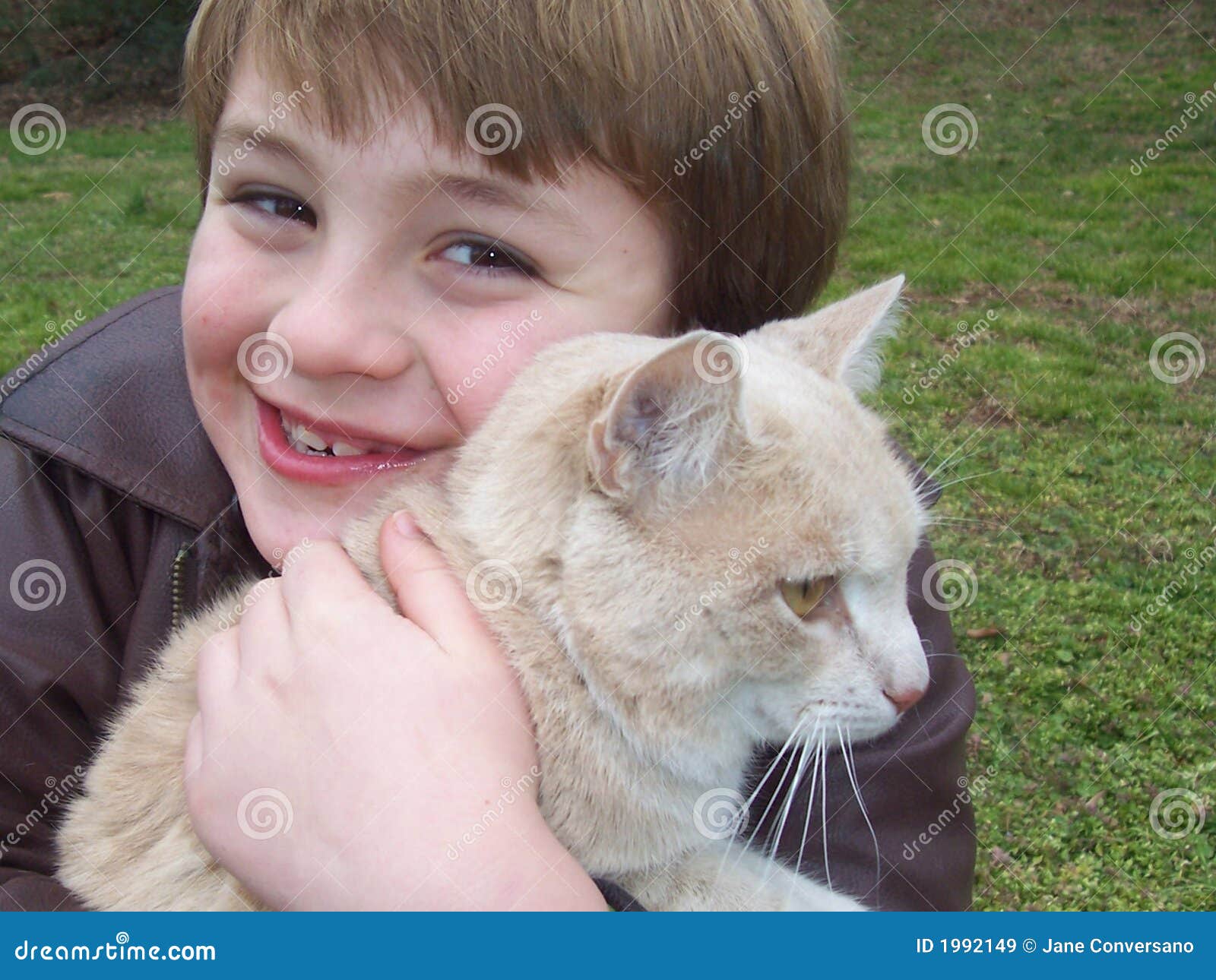 Boy hugging pet cat stock image. Image of smile, whiskers - 1992149