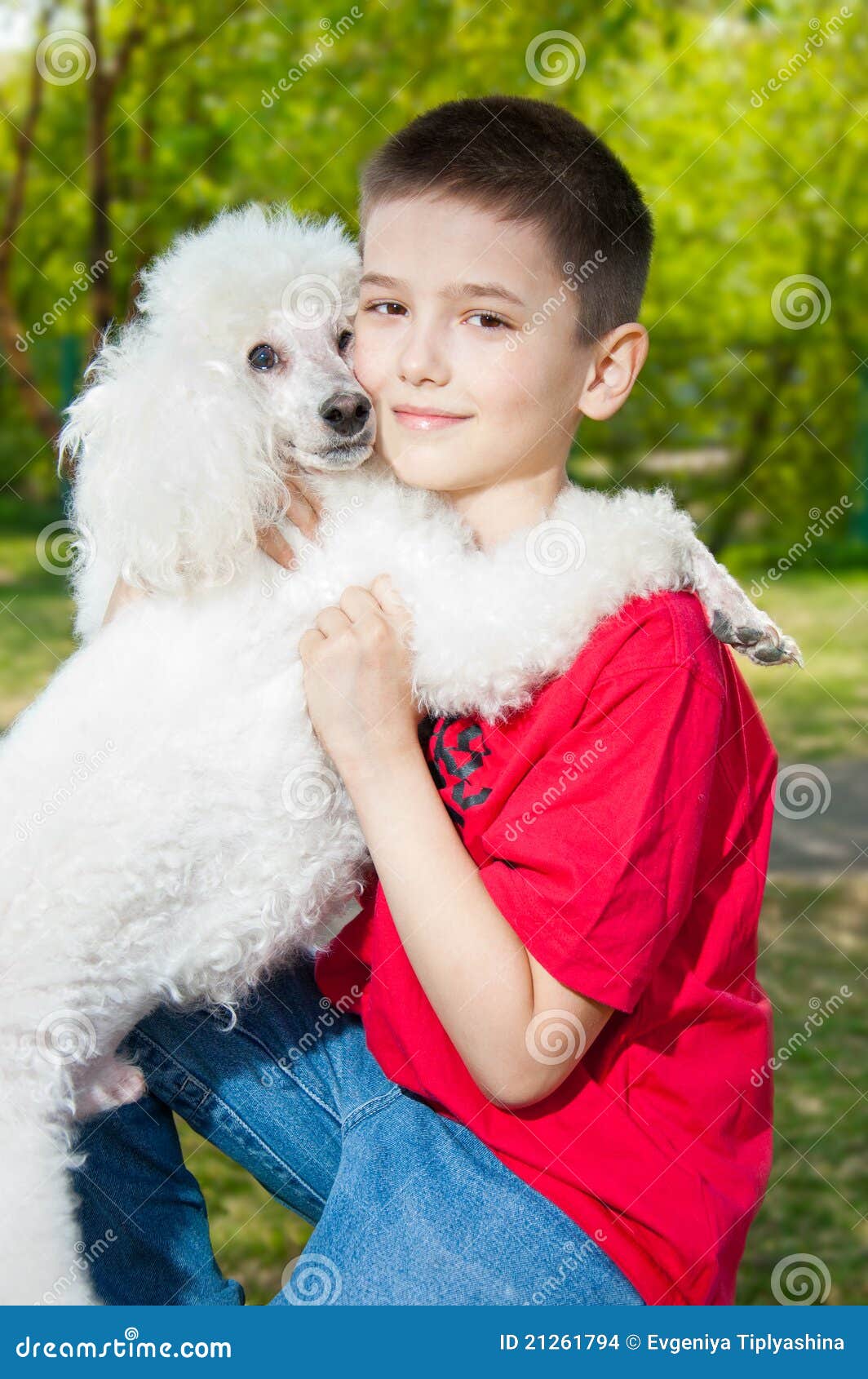 A boy hugs his dog stock photo. Image of adoption, frise - 21261794