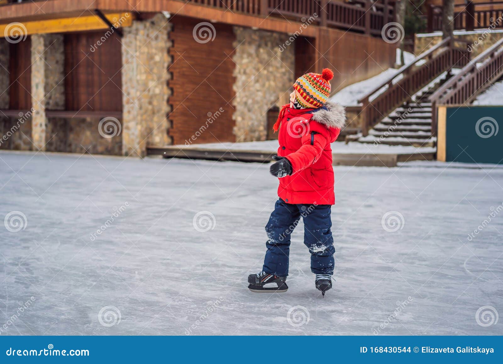 Boy Ice Skating for the First Time Stock Photo - Image of season, rink ...