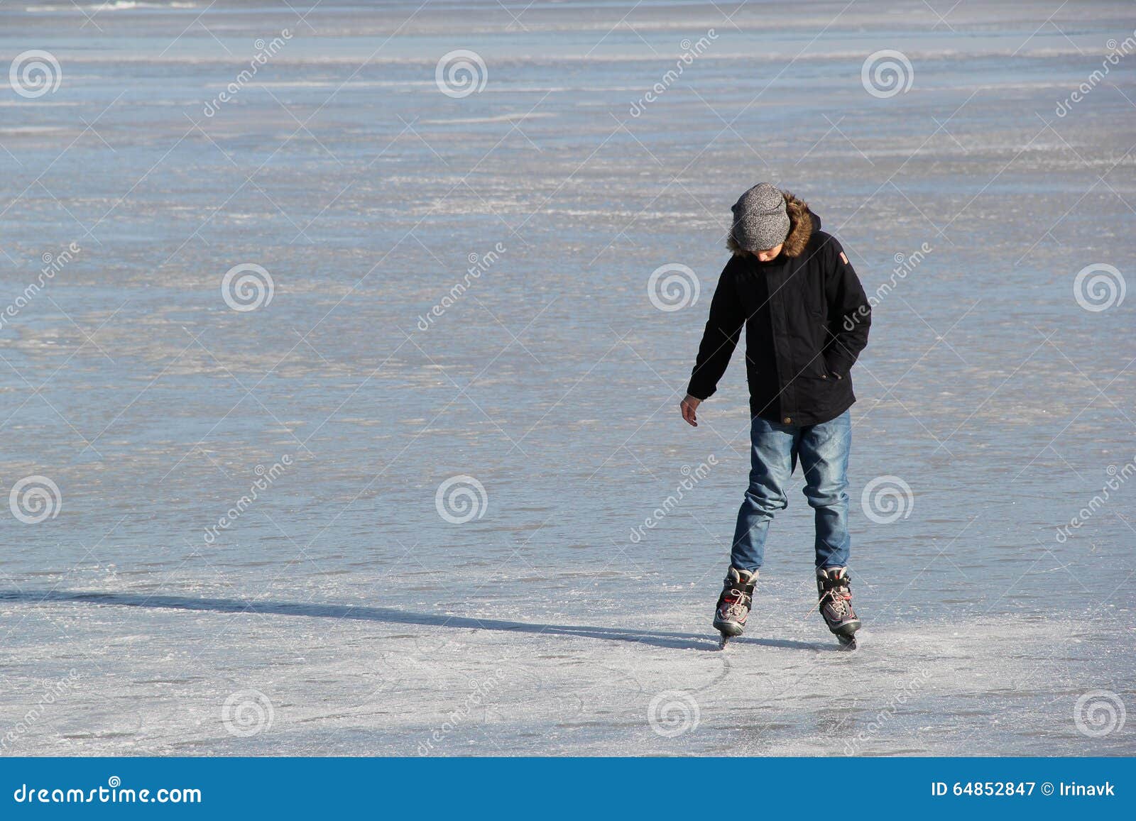 Boy on the Ice with Skating Stock Image - Image of fitness, cold: 64852847