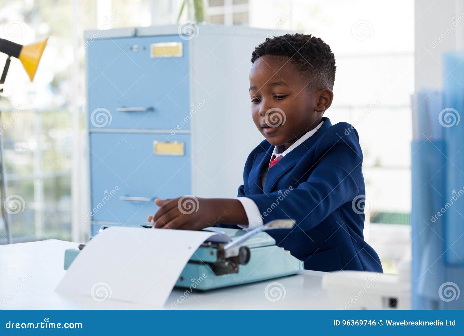 Boy Imitating As Businessman Using Typewriter Stock Photo - Image of ...