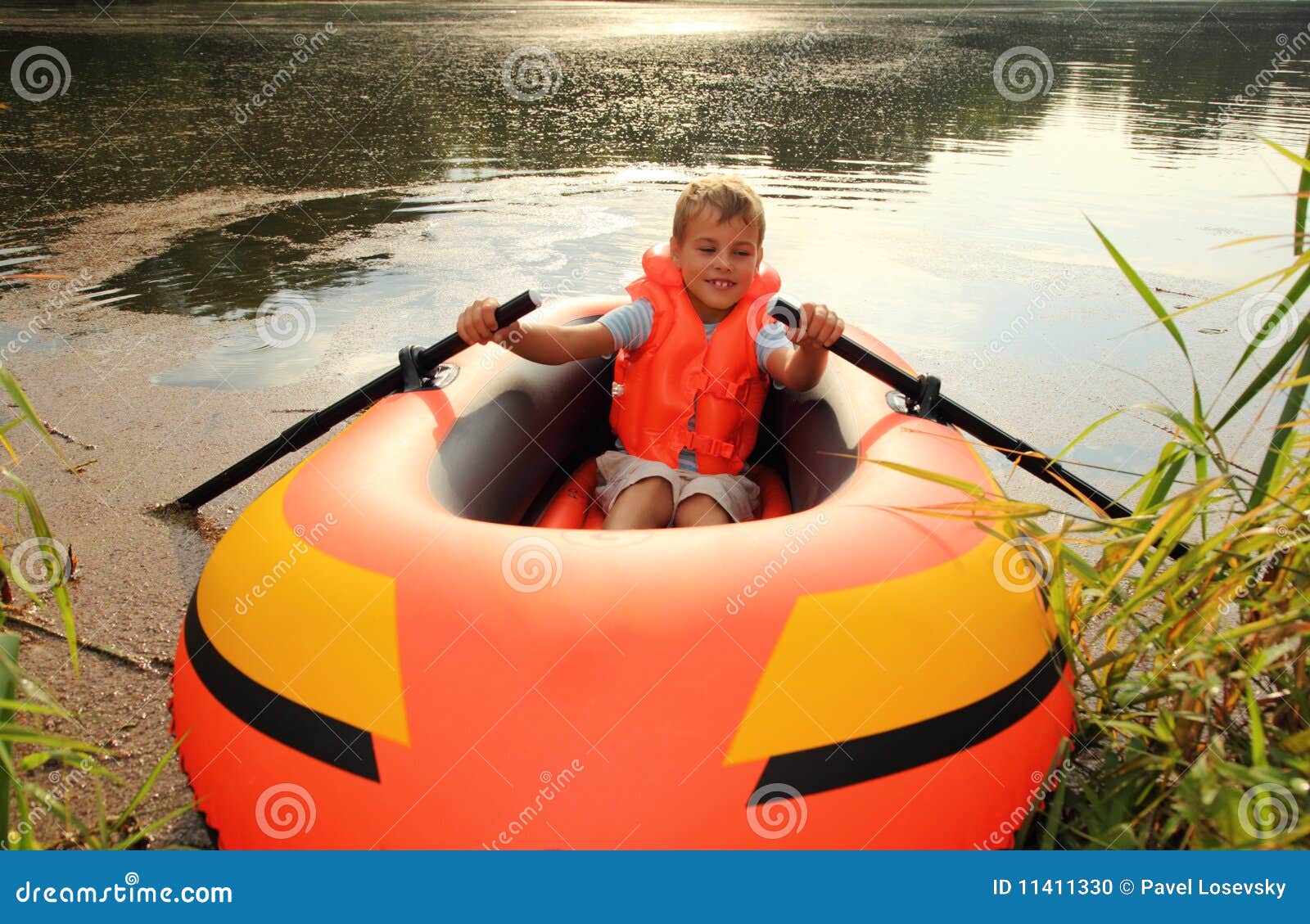 Boy in Inflatable Boat in Water Stock Photo - Image of looking ...