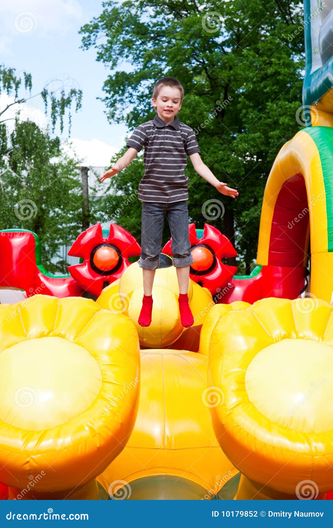 Boy in Inflatable Playground Stock Photo - Image of play, bouncy: 10179852