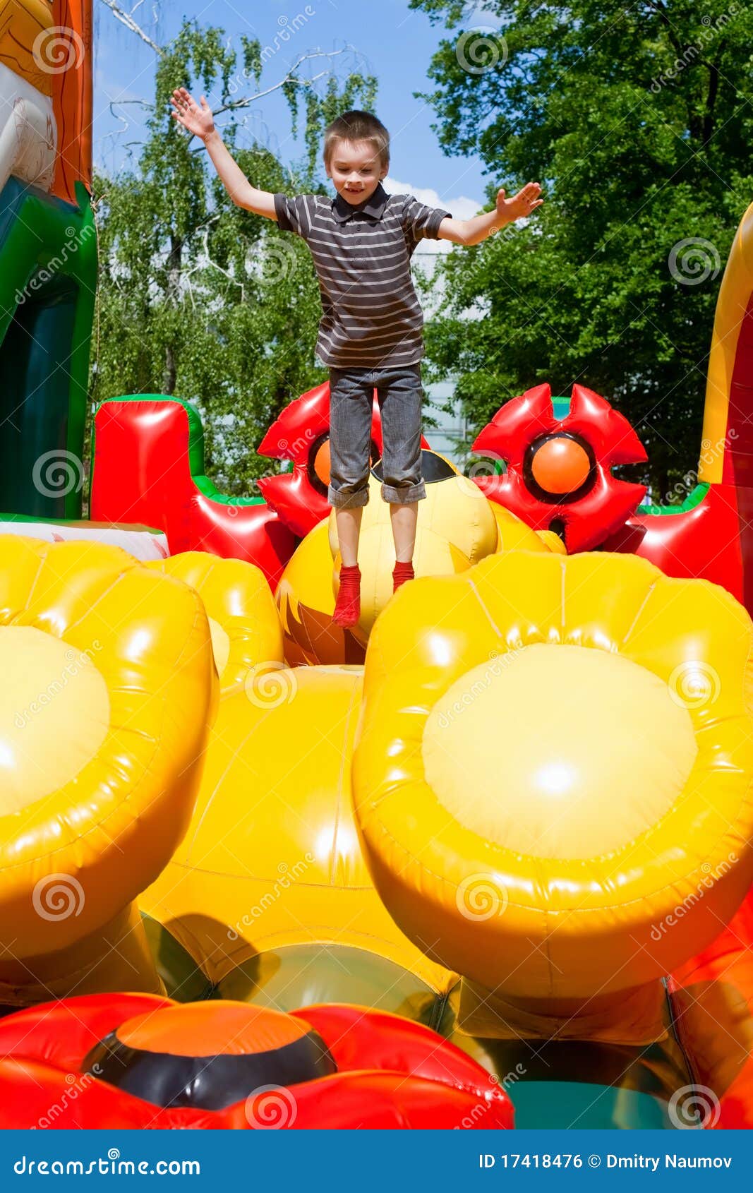 Boy in Inflatable Playground Stock Photo - Image of bouncy, offspring ...
