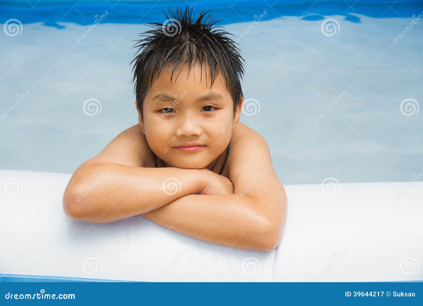 Boy and Inflatable pool stock image. Image of swim, activity - 39644217