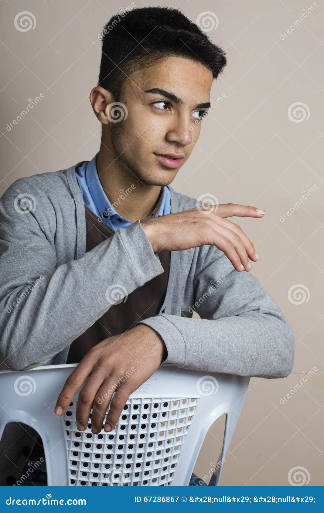 Boy Itting on Chair Inside Studio Stock Image - Image of book, male ...