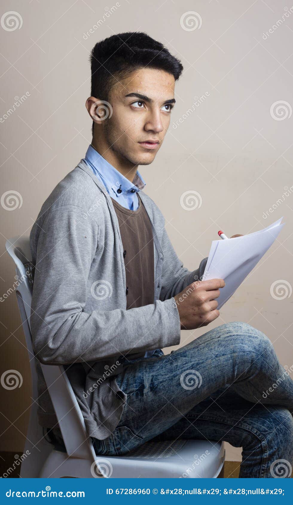 Boy Itting on Chair Inside Studio Stock Photo - Image of desk, cute ...