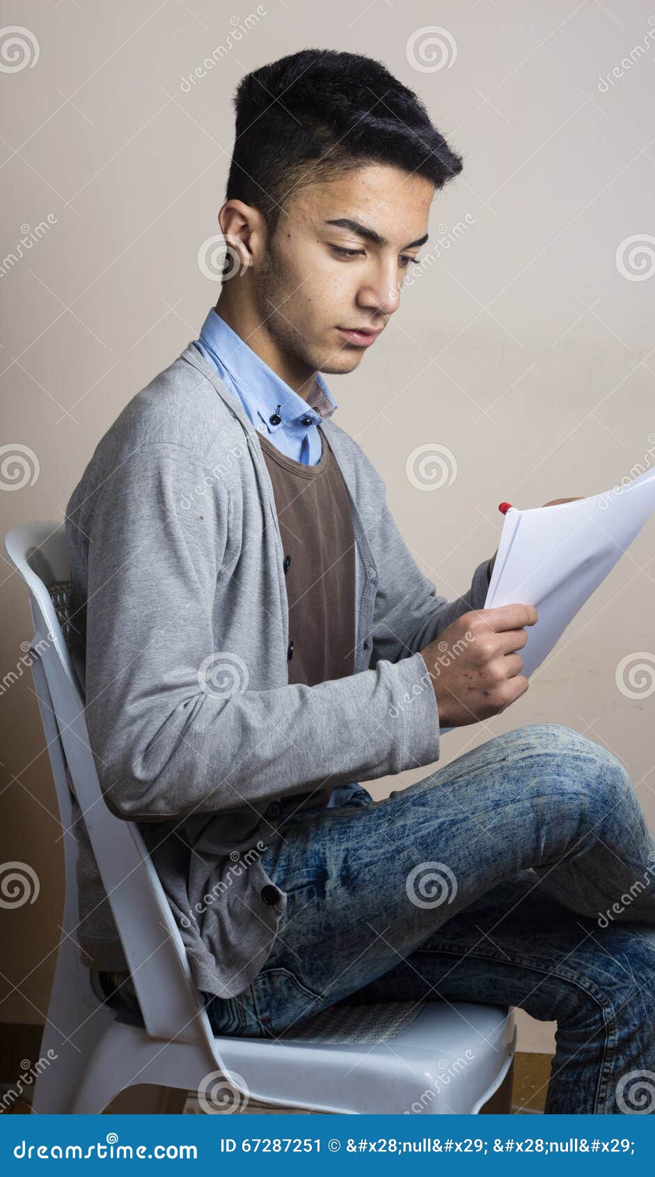 Boy Itting on Chair Inside Studio Stock Image - Image of iraq, copybook ...