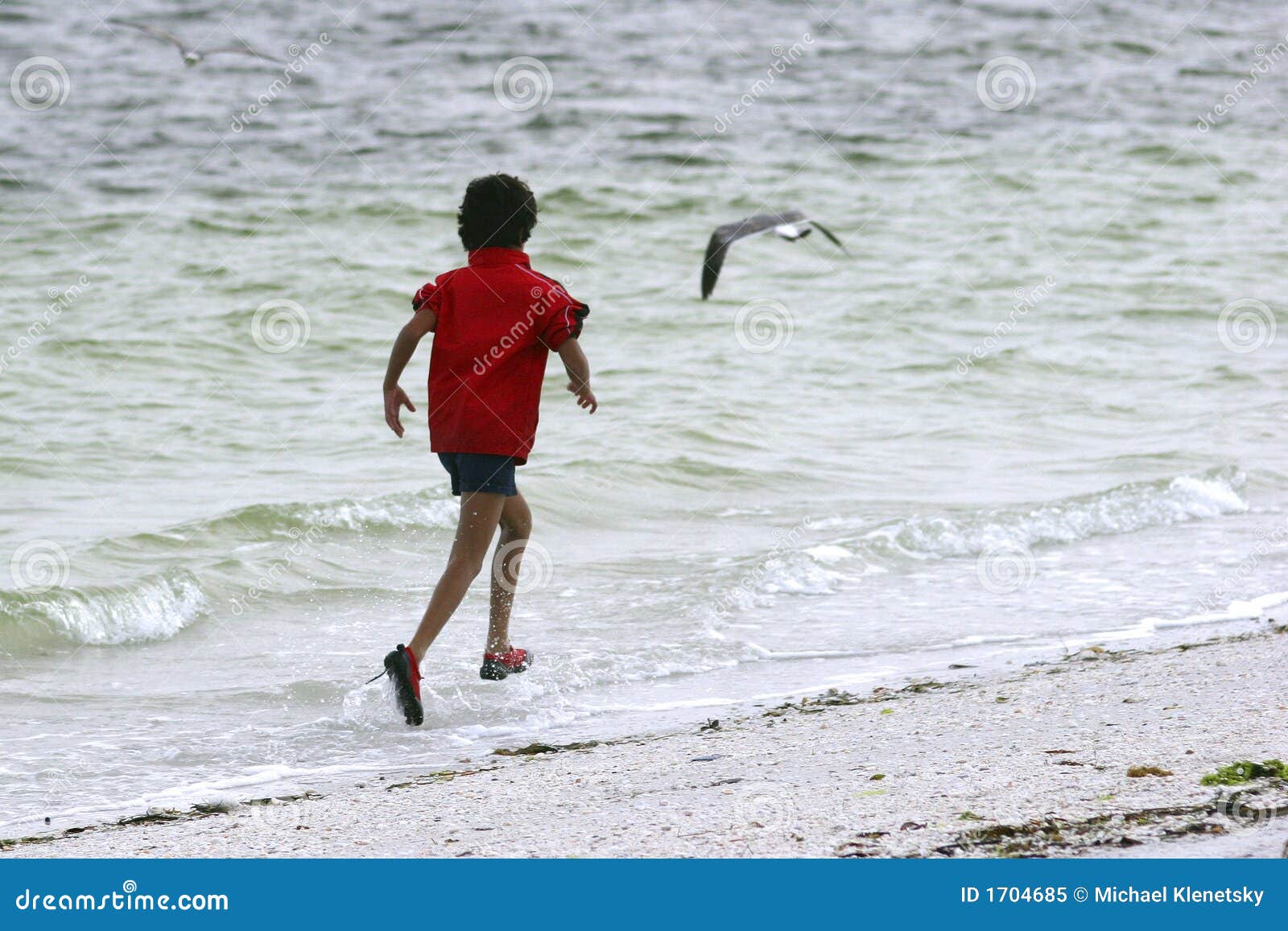Boy Jogging stock image. Image of shore, coast, jogging - 1704685
