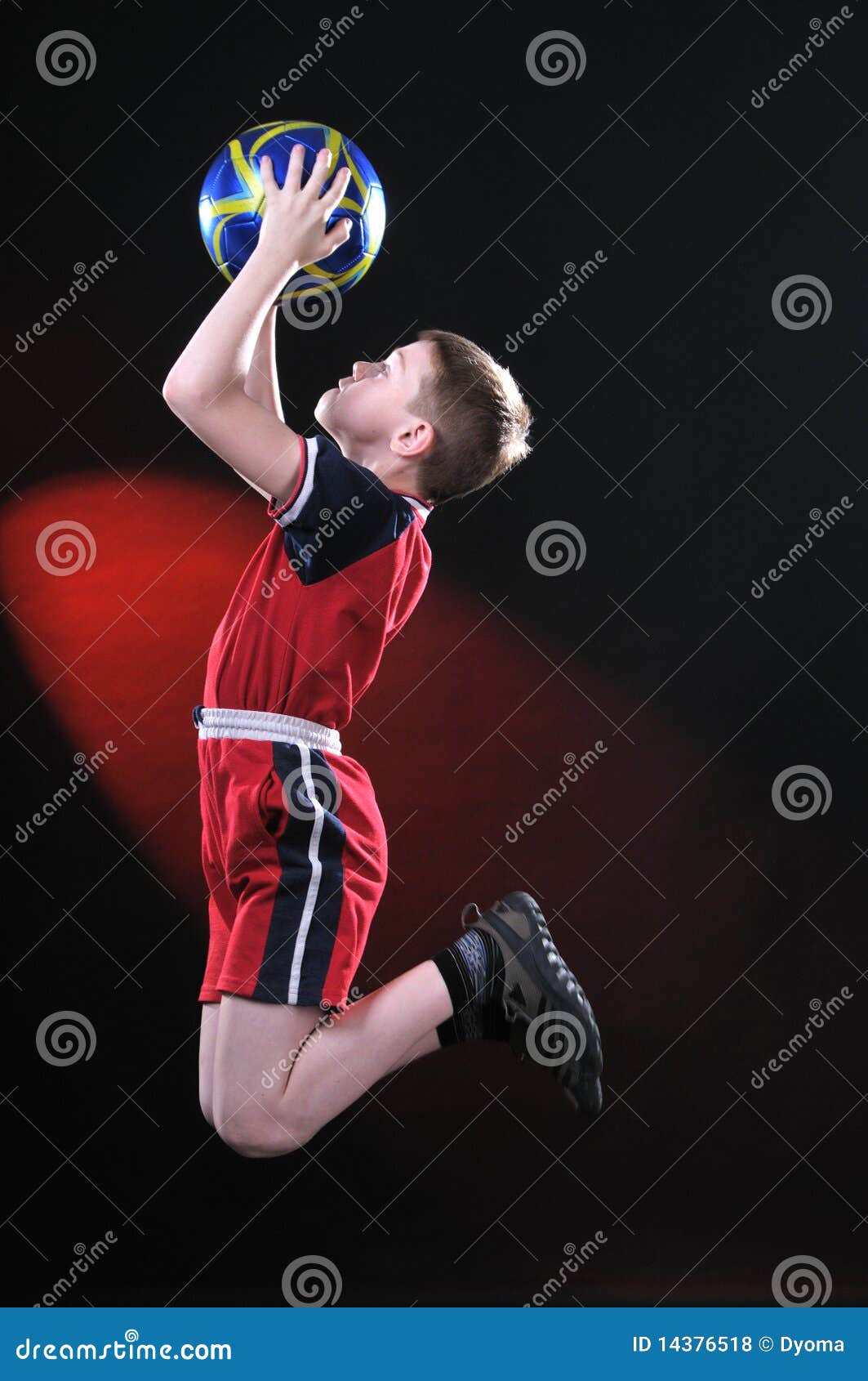Boy In Jump Catches A Soccer Ball Stock Photo - Image of year, cheerful ...