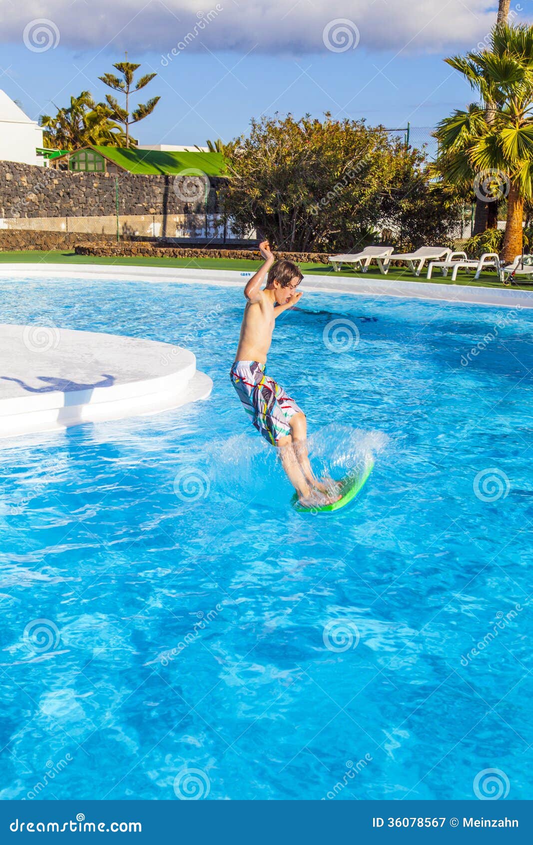 Boy Jumping in the Blue Pool Stock Image - Image of activity, board ...