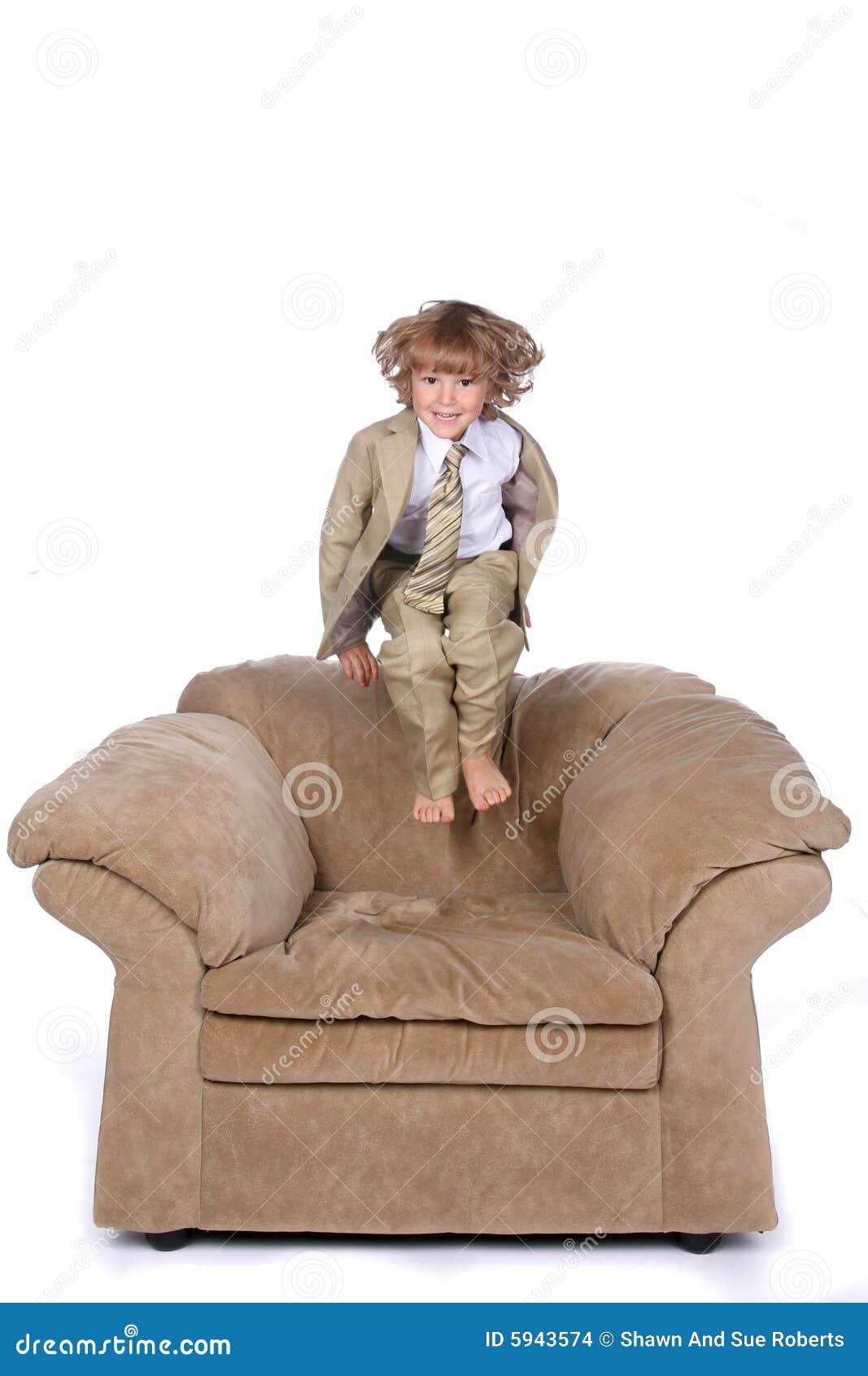 Boy Jumping On Chair Picture. Image: 5943574