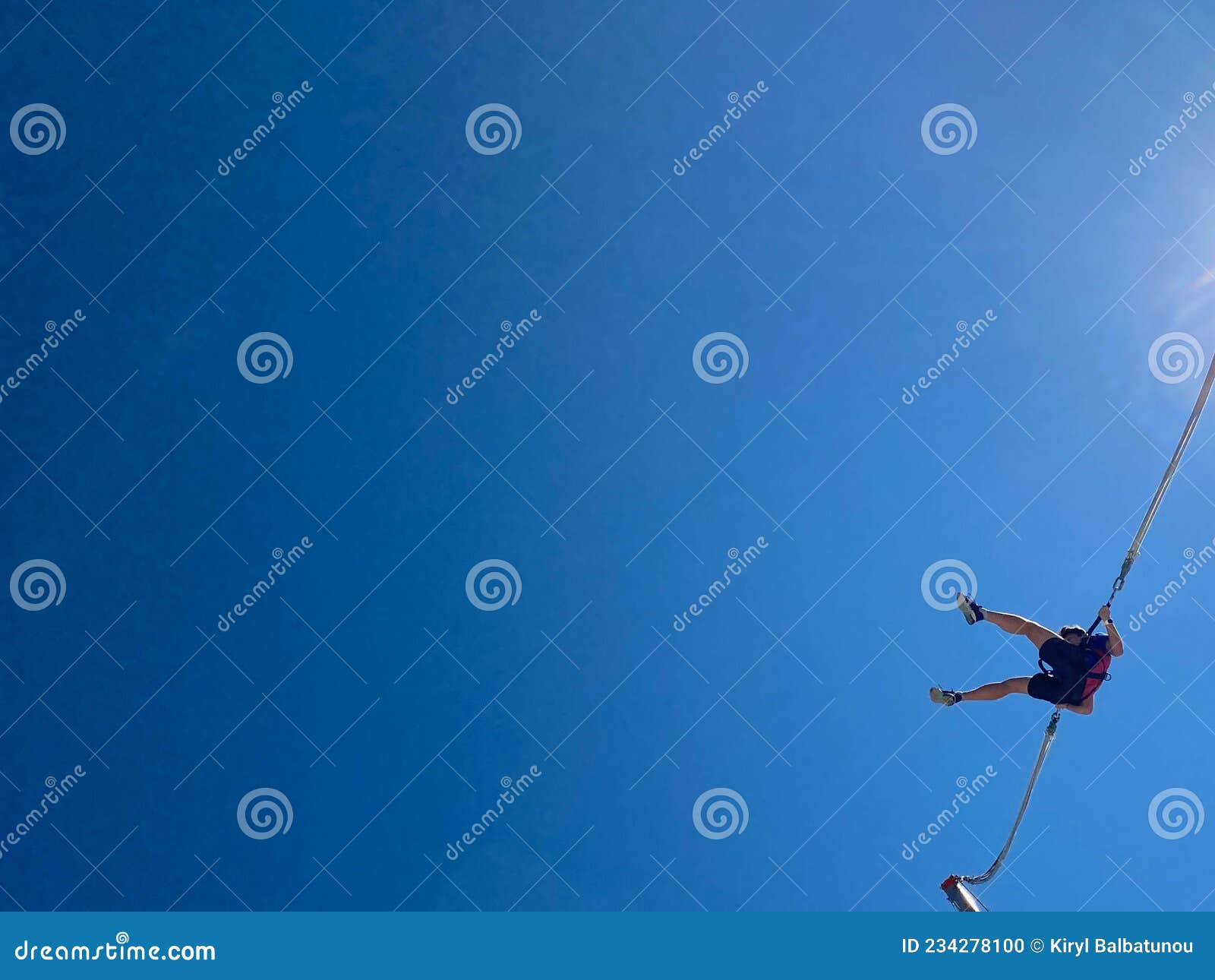 Boy Jumping on an Elastic Band Stock Photo - Image of band, enjoy ...
