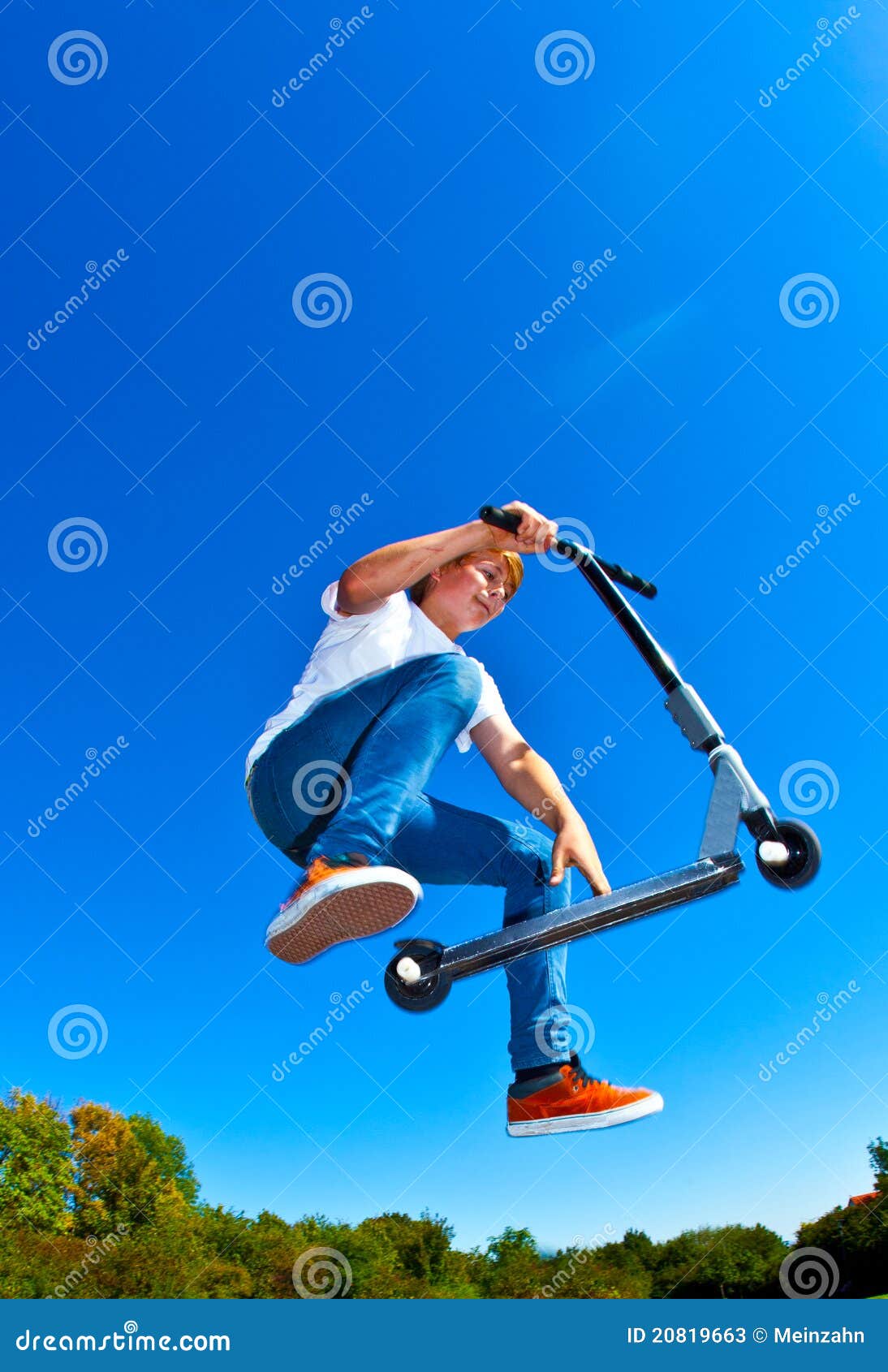 Boy Jumping with His Scooter Stock Image - Image of park, jump: 20819663