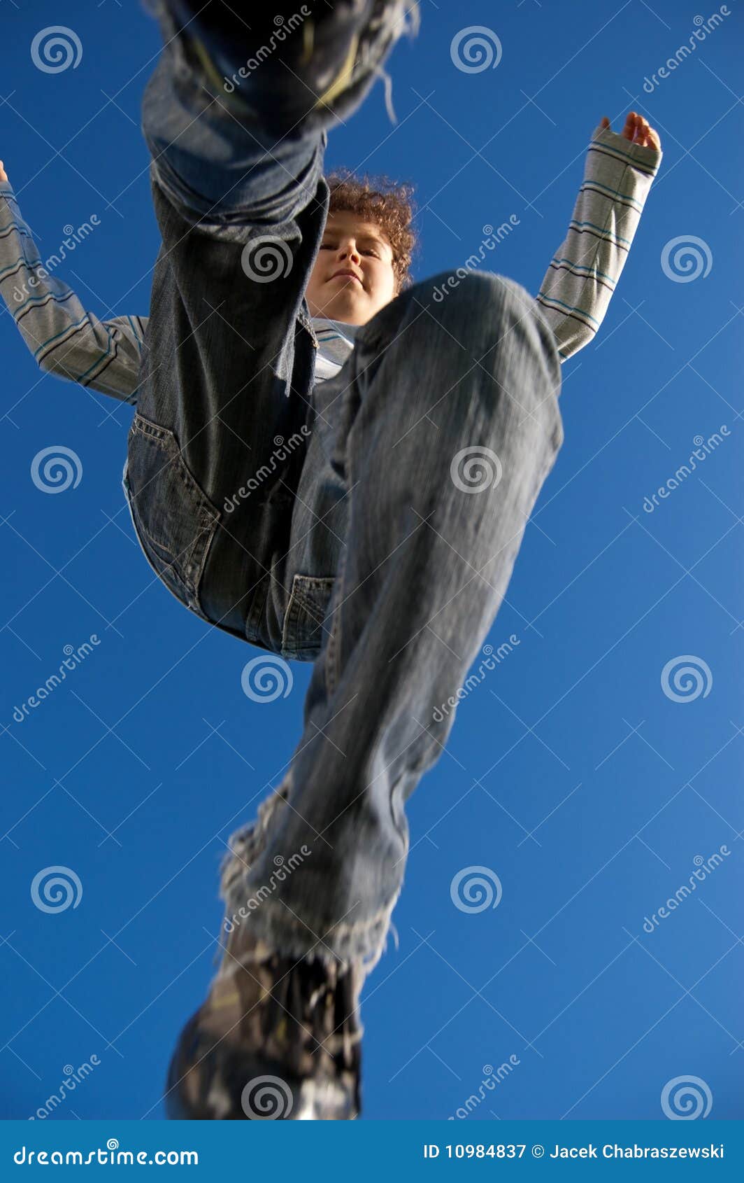 Boy jumping outdoor stock image. Image of male, jogging - 10984837
