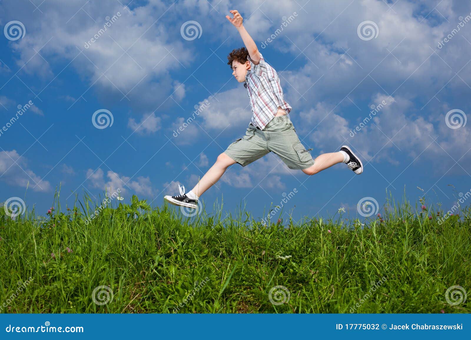 Boy jumping outdoor stock photo. Image of active, adolescent - 17775032