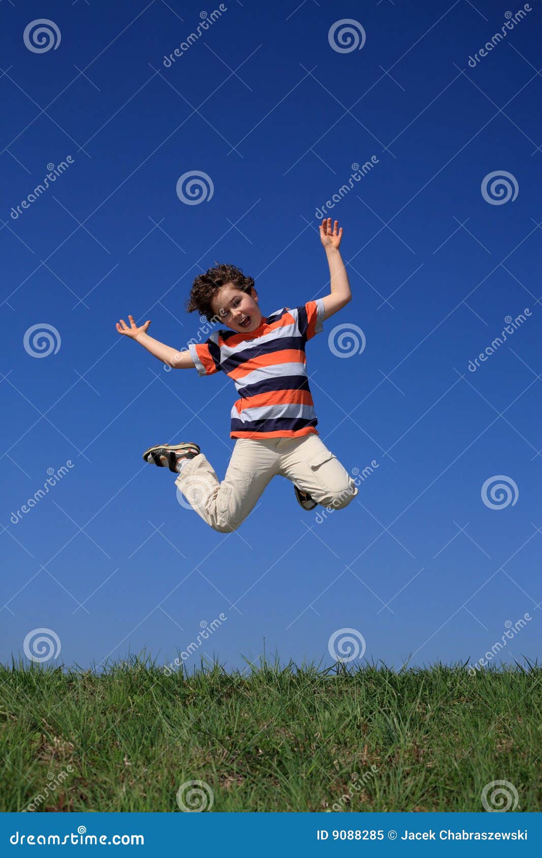 Boy jumping outdoor stock image. Image of leap, blue, meadow - 9088285