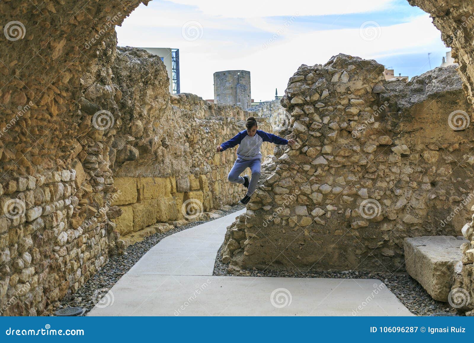 Boy jumping in a ruins stock image. Image of brave, energy - 106096287