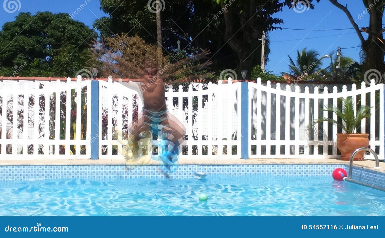 Boy jumping in water editorial photo. Image of water - 54552116
