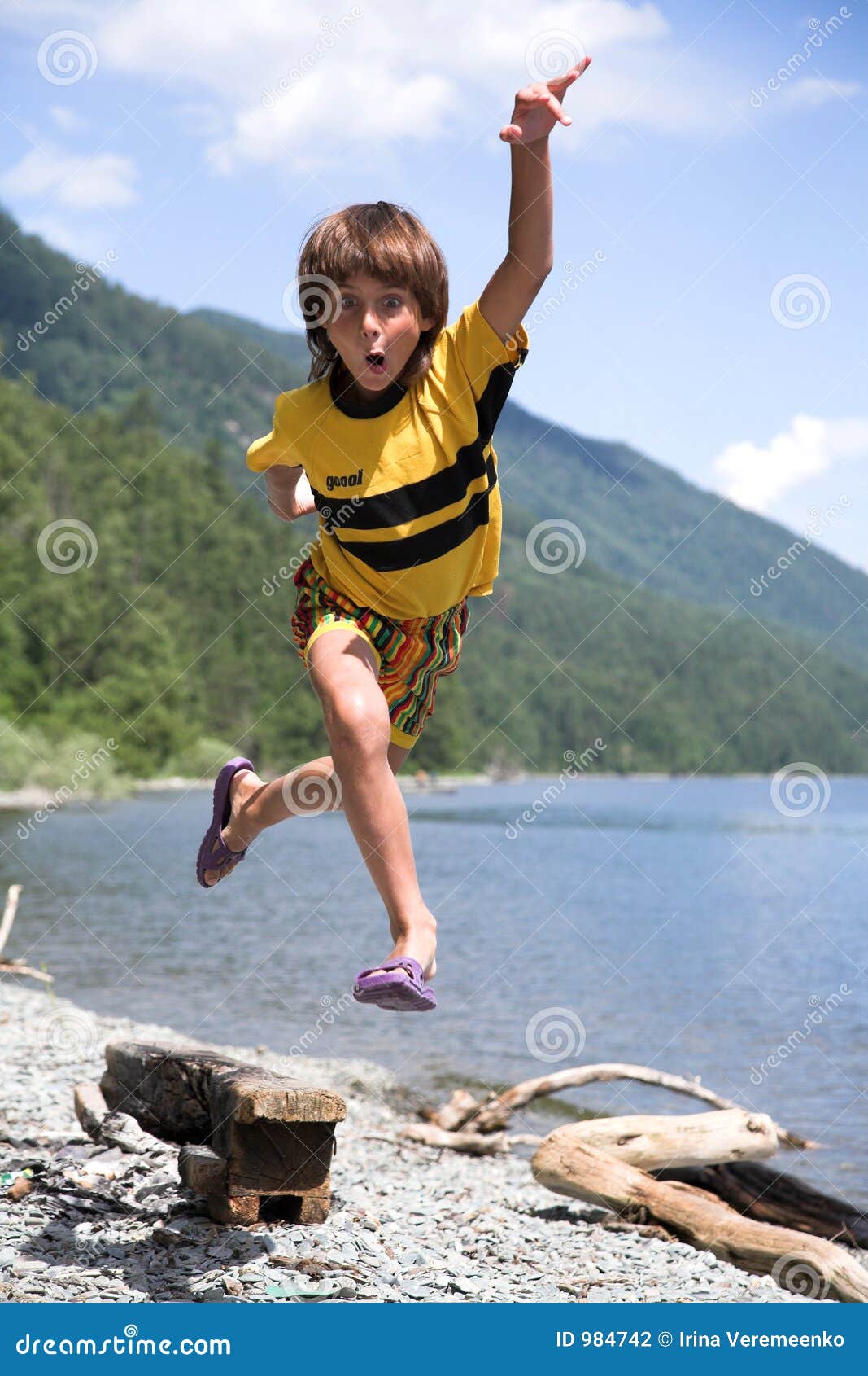 Boy jumps stock photo. Image of altai, mountains, plant - 984742