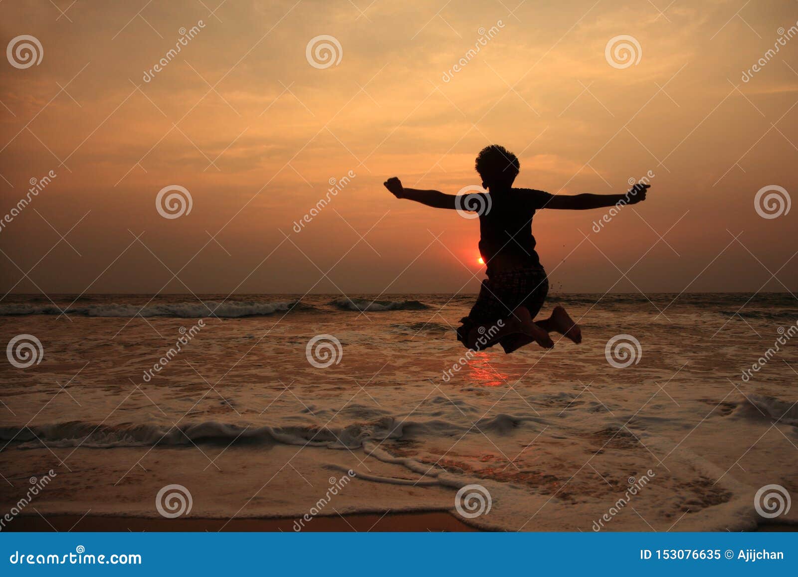 A Boy Jumps in the Waves during Sunset Stock Image - Image of jumping ...