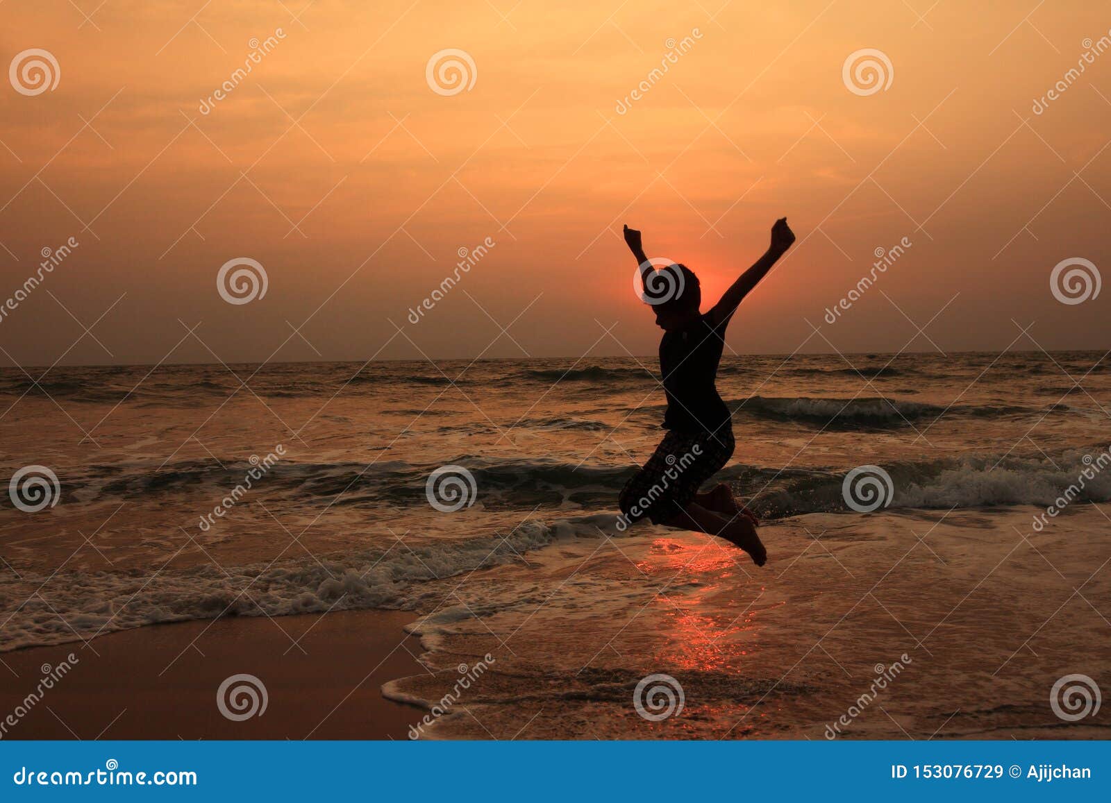 A Boy Jumps in the Waves during Sunset Stock Image - Image of sporty ...