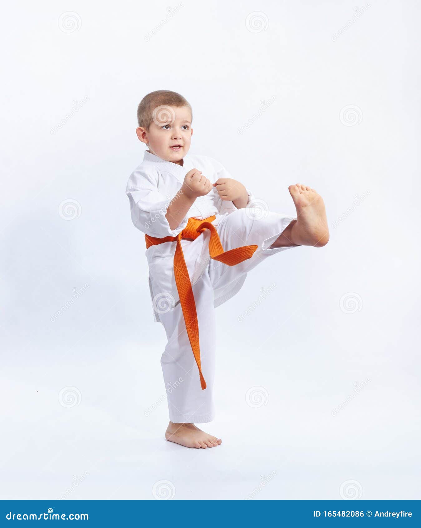 Boy in Karategi Beats Kicking Stock Photo - Image of happiness, belt ...