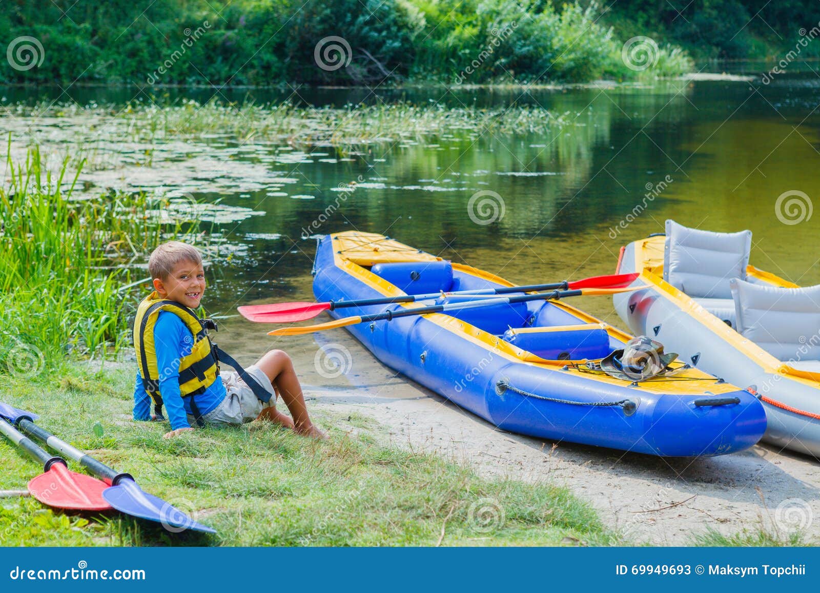 Boy kayaking on the river stock image. Image of life - 69949693