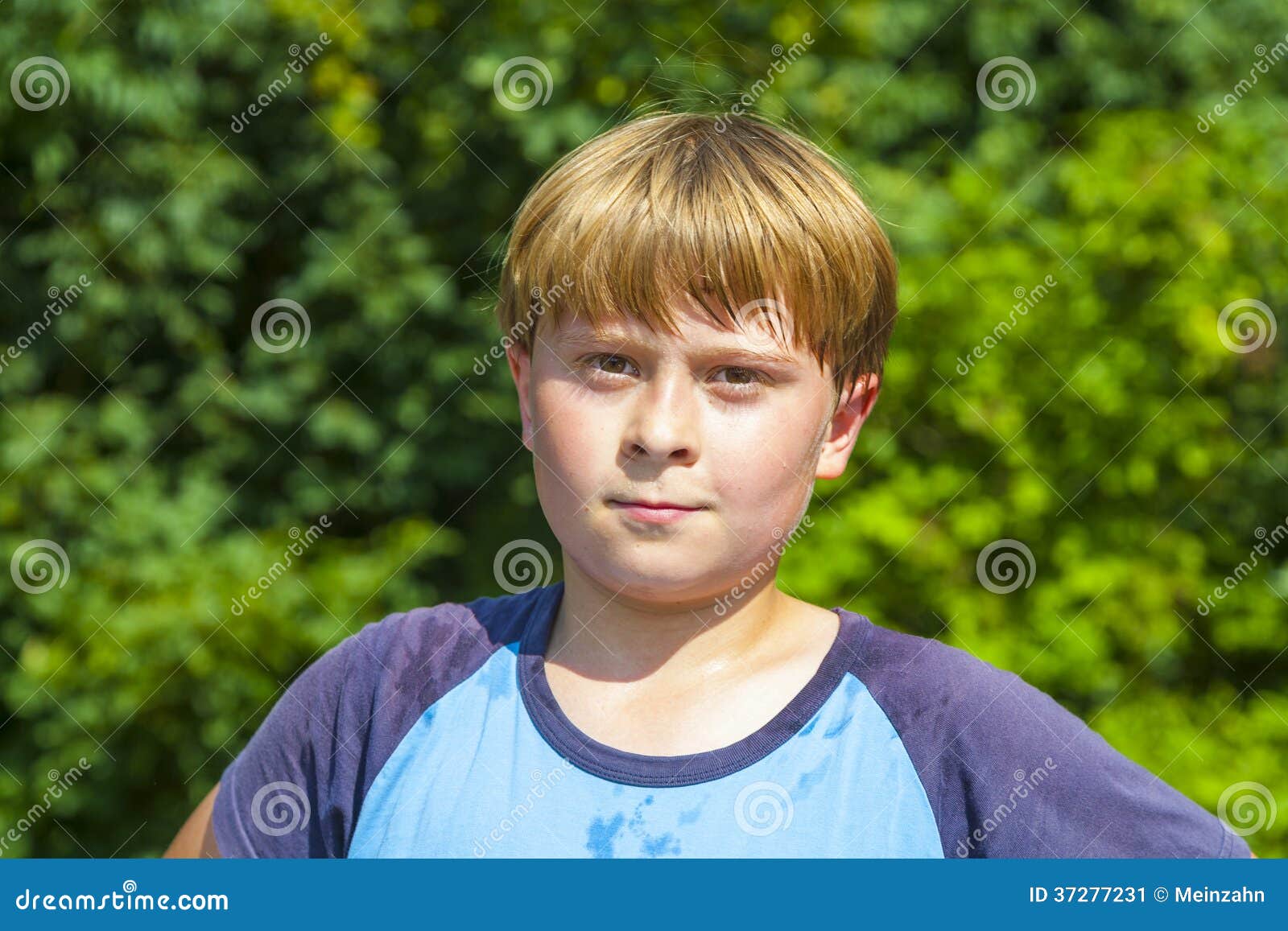 Boy keeps a straight face stock image. Image of eyes - 37277231