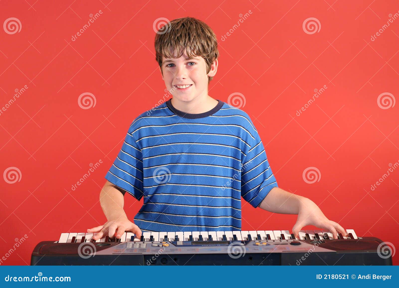 Boy on keyboard straight stock image. Image of teen, music - 2180521