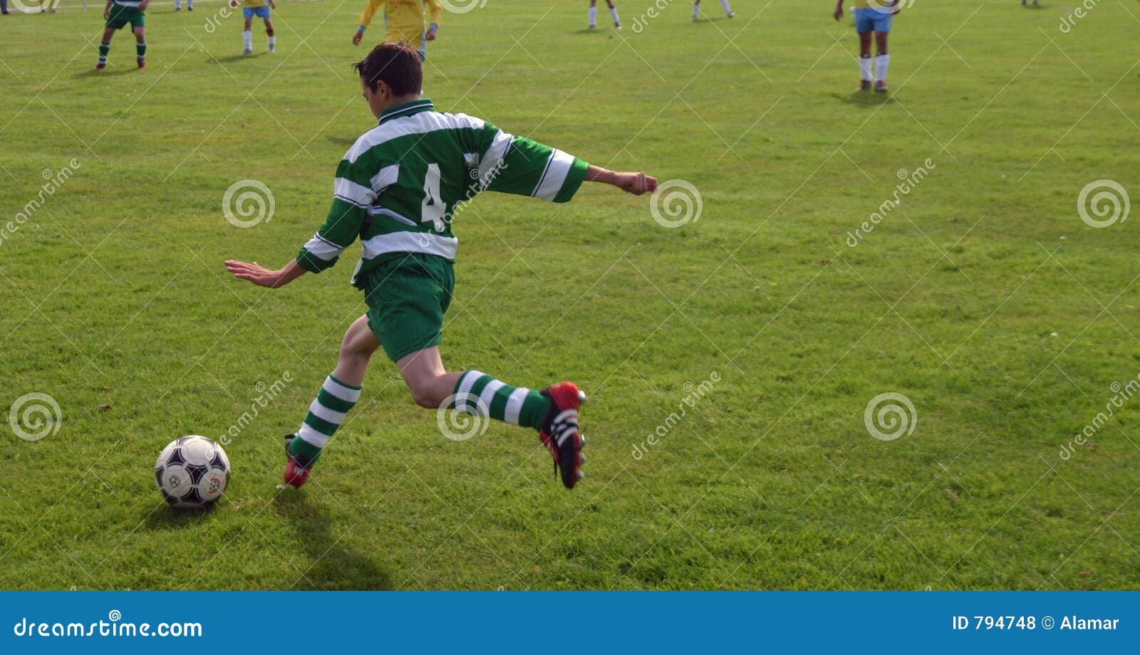 Boy kicking ball stock photo. Image of happy, modern, male - 794748