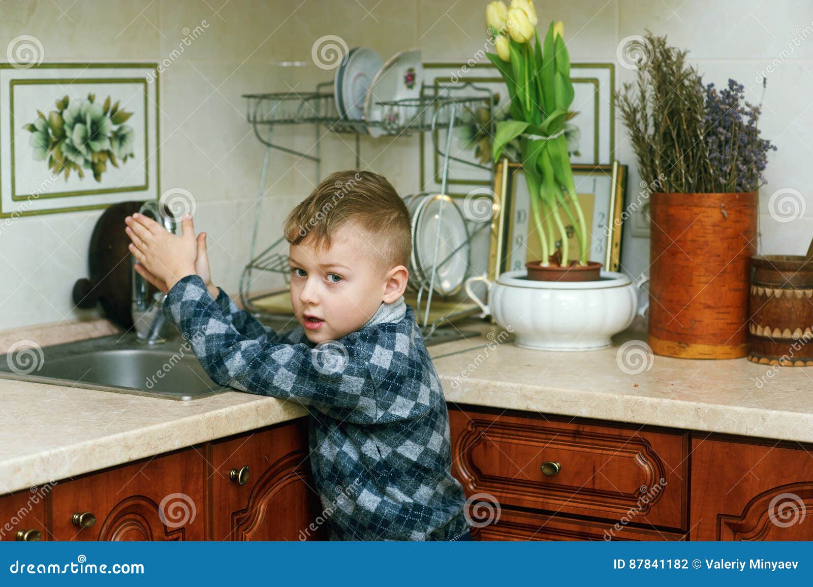 The Boy in the Kitchen .Portrait Indoors Stock Photo - Image of face ...